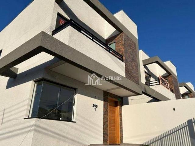 Sobrado com 3 dormitórios à venda, 127 m² por R$ 812.000,00 Atuba Curitiba/PR