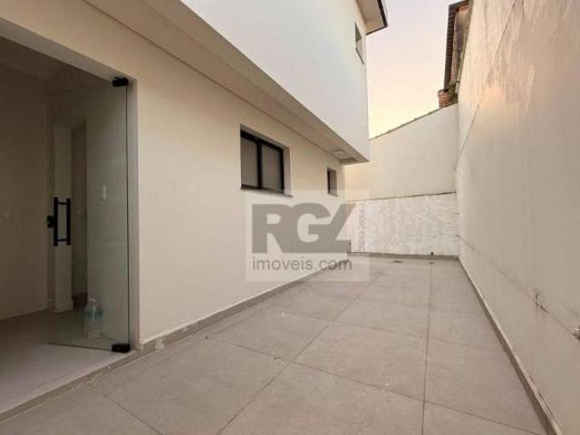 Sobrado com 3 dormitórios à venda, 128 m² por R$ 825.000,00 Estuário Santos/SP