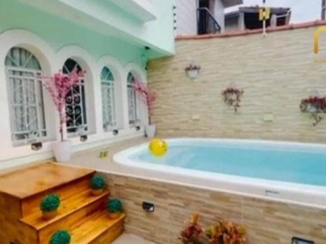 Sobrado com 3 dormitórios à venda, 120 m² por R$ 980.000,00 Boqueirão Praia Grande/SP