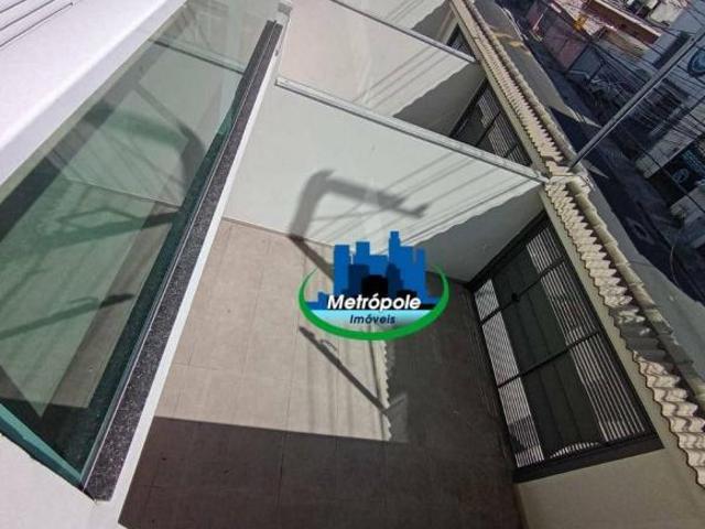 Sobrado com 3 dormitórios à venda, 123 m² por R$ 750.000,00 Vila Barros Guar
