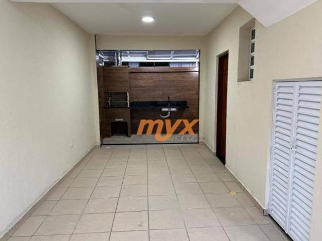 Sobrado com 3 dormitórios à venda, 145 m² por R$ 900.000,00 Aparecida Santos/SP