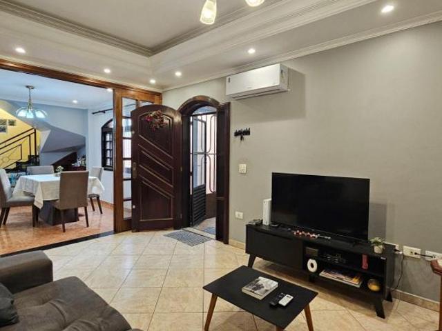 Sobrado com 3 dormitórios à venda, 148 m² por R$ 750.000,00 Mirim Praia Grande/SP