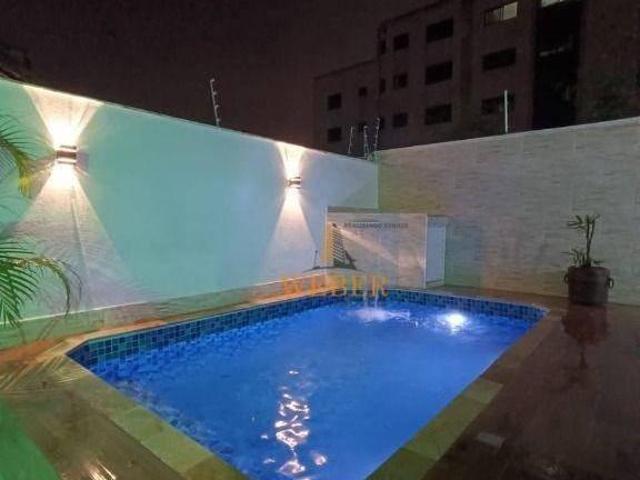 Sobrado com 3 dormitórios à venda, 140 m² por R$ 610.000,00 Aviação Praia Grande/SP