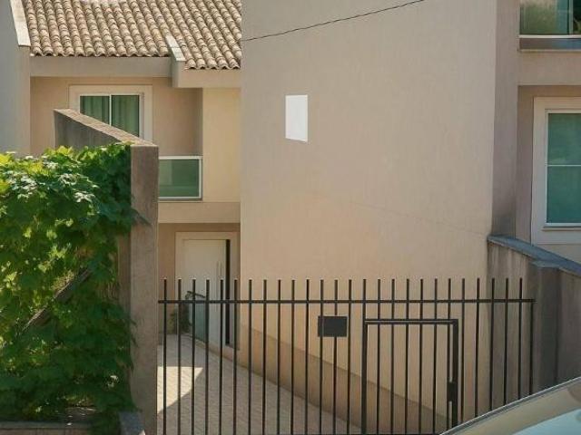 Sobrado com 3 dormitórios à venda, 140 m² por R$ 645.000,00 Boa Vista Curitiba/PR