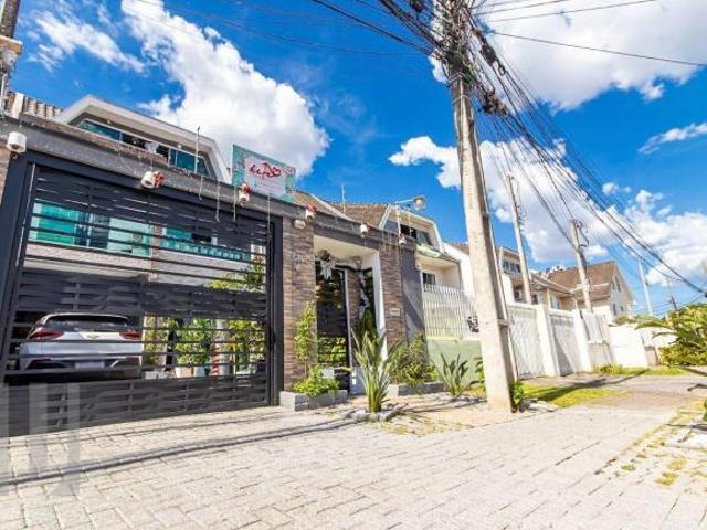 Sobrado com 3 dormitórios à venda, 150 m² por R$ 890.000,00 Novo Mundo Curitiba/PR