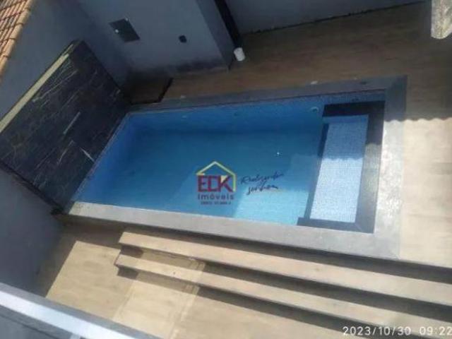 Sobrado com 3 dormitórios à venda, 185 m² por R$ 850.000,00 Centro Bertioga/SP
