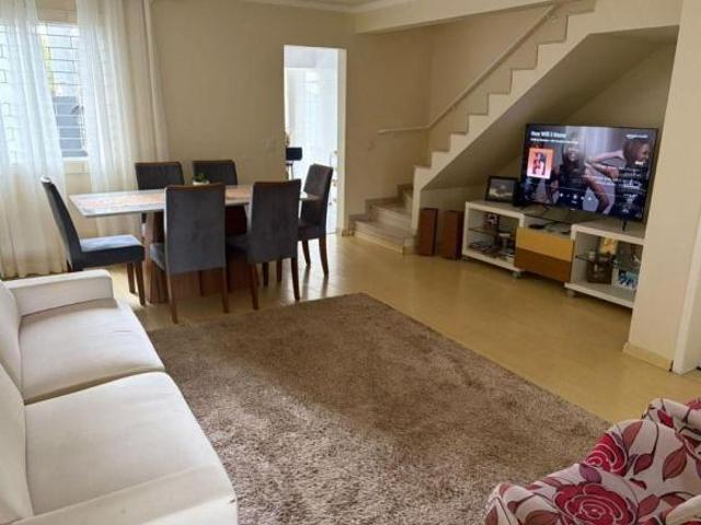 Sobrado com 3 dormitórios à venda, 181 m² por R$ 835.000,00 Novo Mundo Curitiba/PR