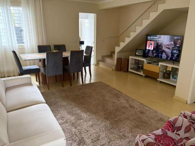 Sobrado com 3 dormitórios à venda, 181 m² por R$ 835.000 Novo Mundo Curitiba/PR