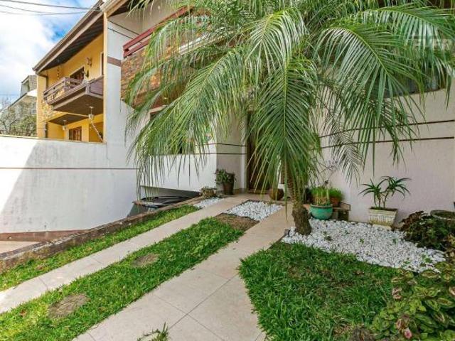 Sobrado com 3 dormitórios à venda, 284 m² por R$ 1.080.000,00 Atuba Curitiba/PR
