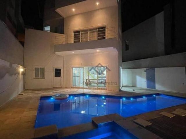 Sobrado com 3 dormitórios à venda, 300 m² por R$ 2.850.000,00 Aruã Ecopark Lagos Mogi das Cruzes