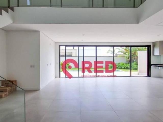 Sobrado com 3 dormitórios à venda, 339 m² por R$ 2.950.000,00 Alphaville Nova Esplanada Votorant