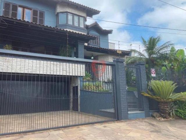 Sobrado com 3 dormitórios à venda, 330 m² por R$ 1.750.000,00 Dom Feliciano Gravataí/RS