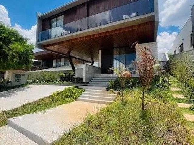 Sobrado com 3 dormitórios à venda, 460 m² por R$ 3.500.000,00 Condomínio Alpha