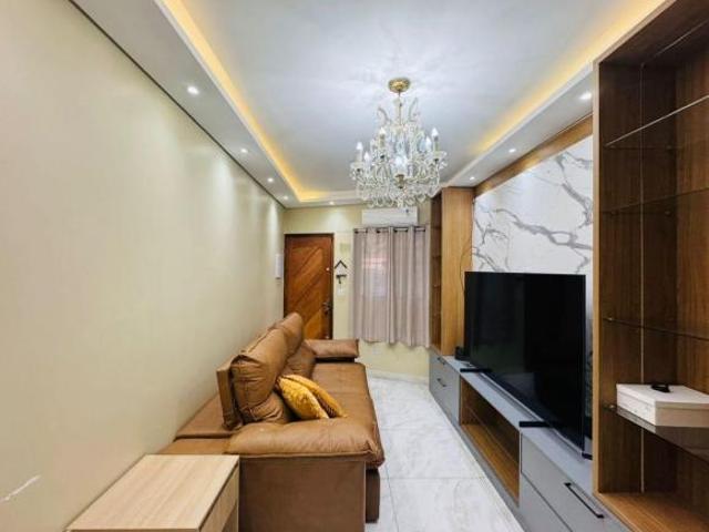 Sobrado com 3 dormitórios à venda, 87 m² por R$ 636.000,00 Real Praia Grande/SP