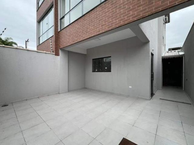 Sobrado com 3 dormitórios à venda, 88 m² por R$ 550.000,00 Maracanã Praia Grande/SP