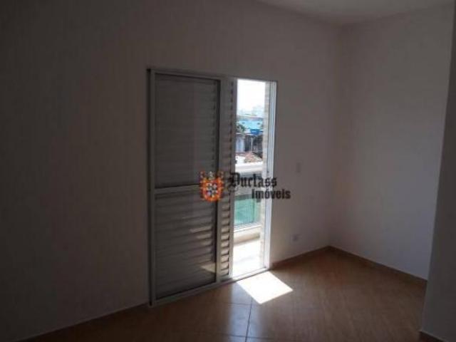 Sobrado com 3 dormitórios à venda, 92 m² por R$ 370.000,00 Catiapoã São Vicente/SP