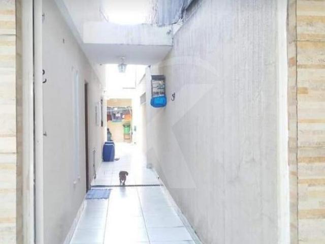 Sobrado com 3 dormitórios e 2 vagas no Jardim Brasil