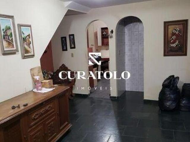 Sobrado com 3 dormitórios, varanda, quintal e 5 vagas cobertas Vila Tolstoi