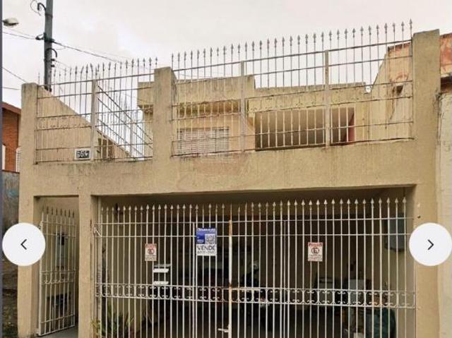 SOBRADO COM 3 QUARTOS 1 SUITE, COZINHA PLANEJADA, CHURRASQUEIRA E 2 VAGAS COMBERTAS