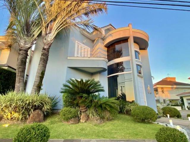 SOBRADO COM 3 SUÍTES EM CONDOMINIO FECHADO EM CANOAS