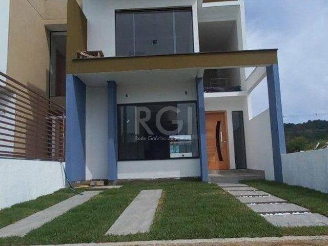 Sobrado com 3 suítes no bairro Aberta dos Morros