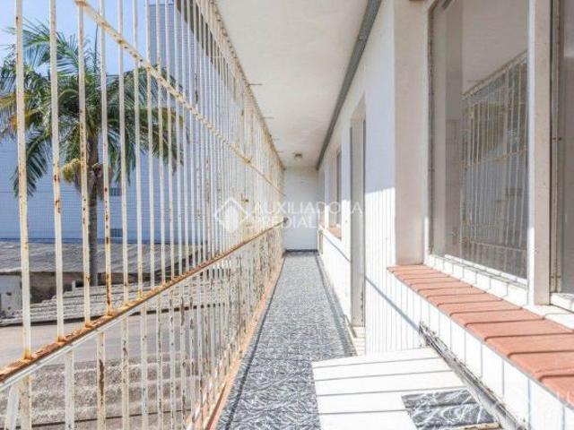 Sobrado com terreno de 522m ² e sala comercial Cristo Redentor