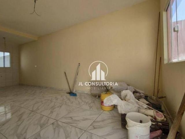 Sobrado com três quartos/suíte espaço de terreno nos fundos e terraço