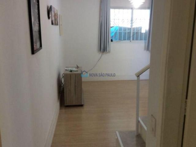 Sobrado com churrasqueira em Campo Belo com 2 garagens, 3 dormitórios e edícula