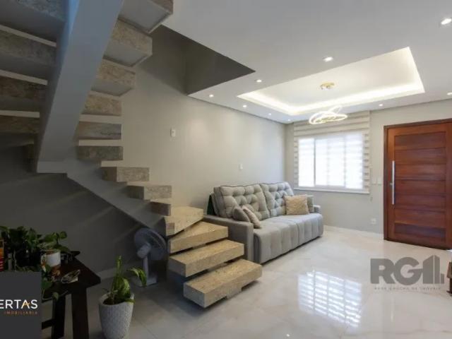 Sobrado com dois andares e área de terraço