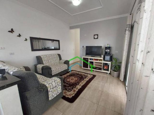 Sobrado com duas casas e salão comercial à venda