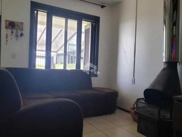 Sobrado com entrada individual semimobiliado com 02 dormitórios e 1 vaga de garagem