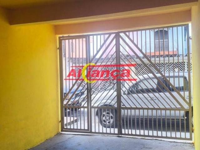 SOBRADO COM GARAGEM, VARANDA COM CHURRASQUEIRA E CASA TÉRREA NO PRESIDENTE DUTRA, GUARULHOS, SP