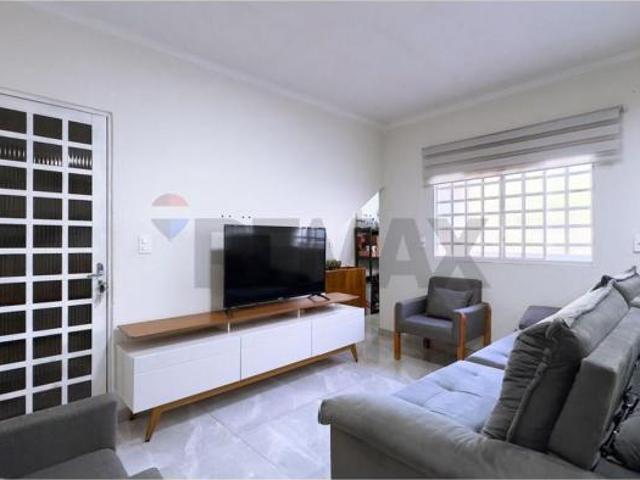 Sobrado com loja comercial com Apartamento ade 402 RECANTO DAS EMAS