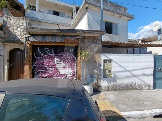 Sobrado com loja comercial Jardim Brasil