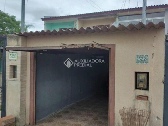SOBRADO COM PÁTIO INDIVUAL FRENTE E FUNDOS