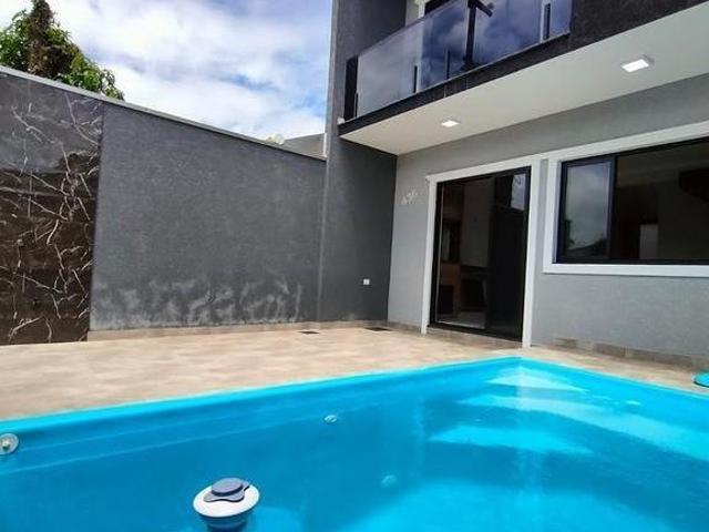 Sobrado com piscina em Praia de Leste