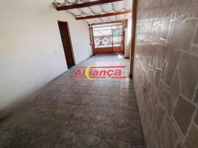Sobrado com ponto comercial