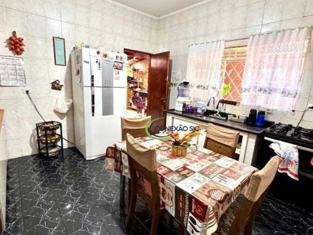 Sobrado com ponto comercial em avenida