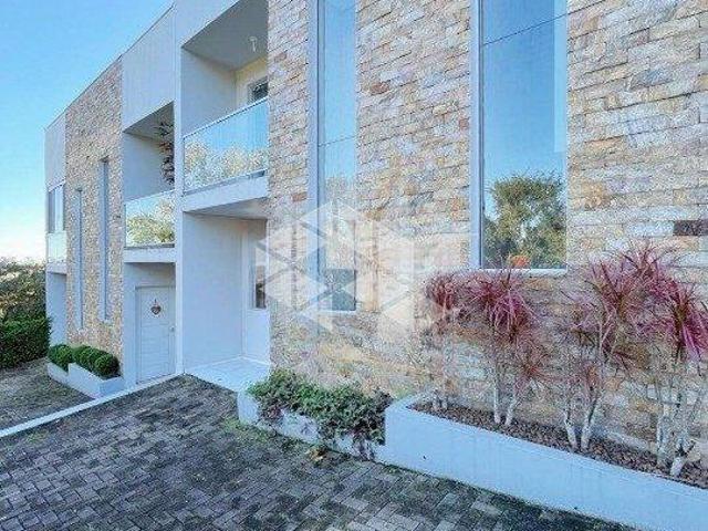 Sobrado duplex semimobiliado à venda no bairro Rondônia, Novo Hamburgo