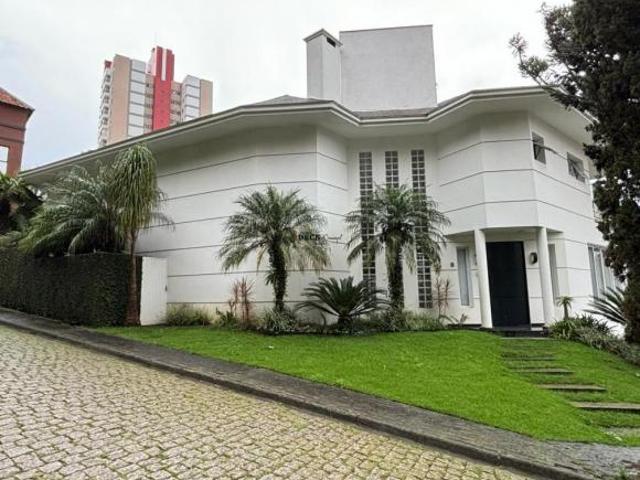Sobrado de alto padrão em condomínio fechado no Ecoville, 3 dormitó