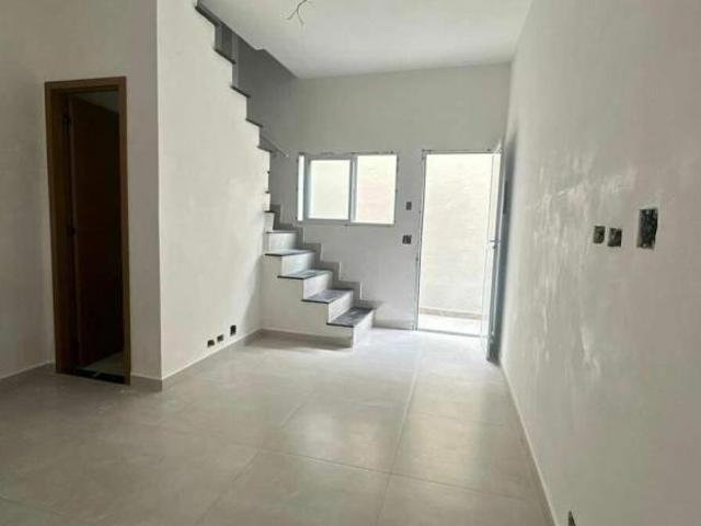 Sobrado de condomínio com 2 dormitórios à venda, 52 m² por R$ 380.000 Aviação Praia Grande/SP