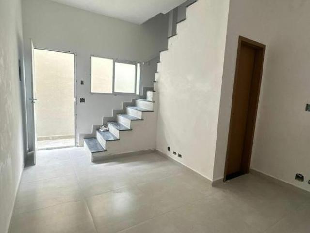 Sobrado de condomínio com 2 dormitórios à venda, 52 m² por R$ 380.000 Aviação Praia Grande/SP