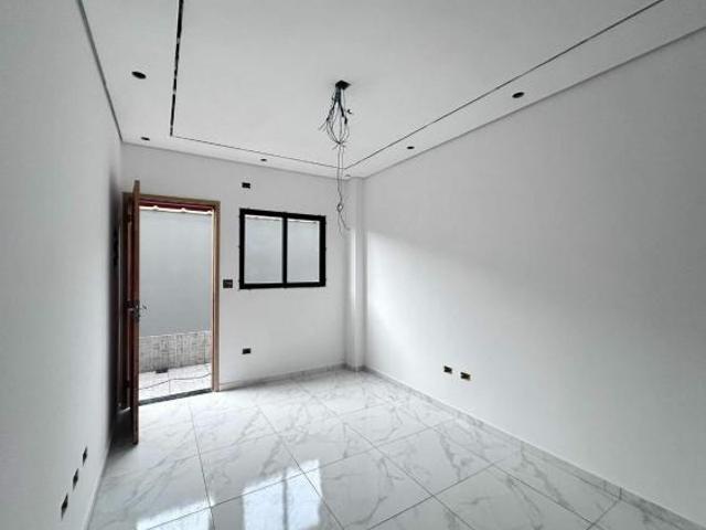 Sobrado de condomínio com 2 dormitórios à venda, 55 m² por R$ 355.000 Tude Bastos Praia Grande/S