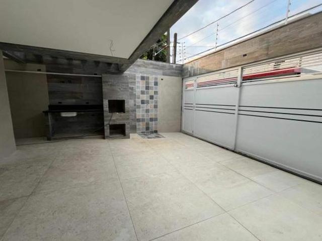 Sobrado de condomínio com 2 suítes à venda, 88 m² por R$ 480.000 Vila Guilhermina Praia Grande/S