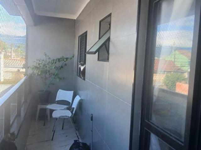 Sobrado de condomínio no bairro Maracanã em Praia Grande SP