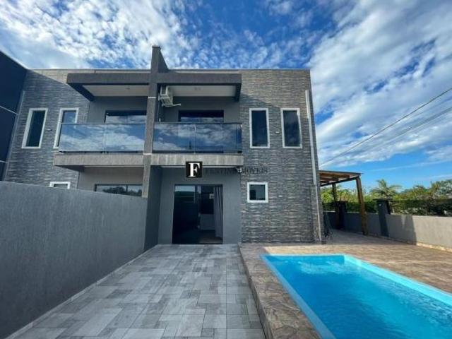 Sobrado de esquina com piscina a venda Primavera