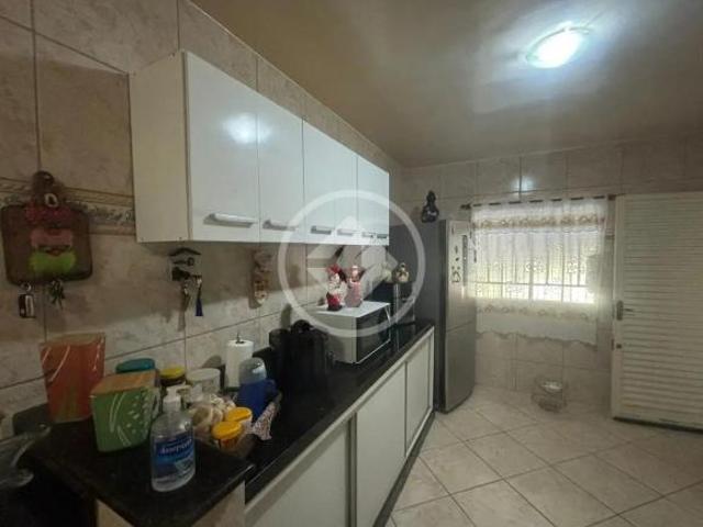 SOBRADO DE 04 QUARTOS, DOIS BANHEIROS E QUINTAL.. GARAGEM PARA UM CARRO