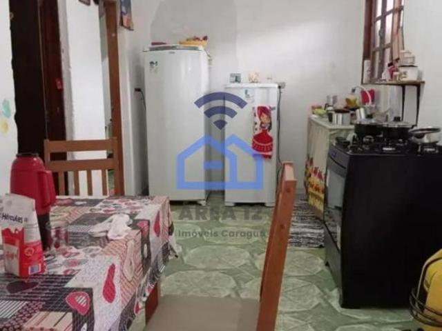Sobrado de 2 dormitórios à venda no bairro do Porto Novo em Caraguatatuba, SP Ótima oportunidade!