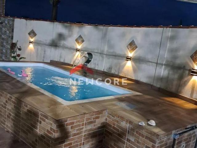 Sobrado em Avenida Diamantino Cruz Ferreira Mourão Princesa Praia Grande/SP