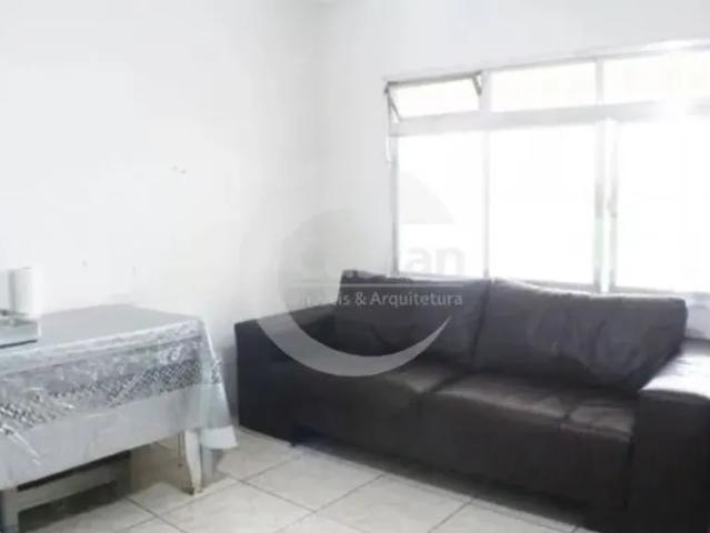 Terreno com três casas